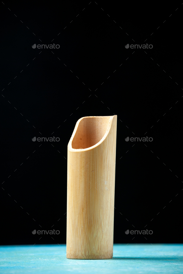 front view wooden upright spoon rest on dark background free space ...