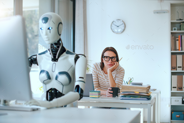Disappointed stressed woman and AI robot in the office Stock Photo by ...
