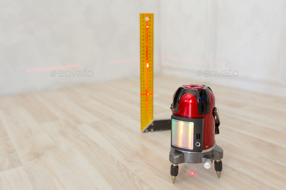 Laser level measuring tool Stock Photo by FabrikaPhoto | PhotoDune