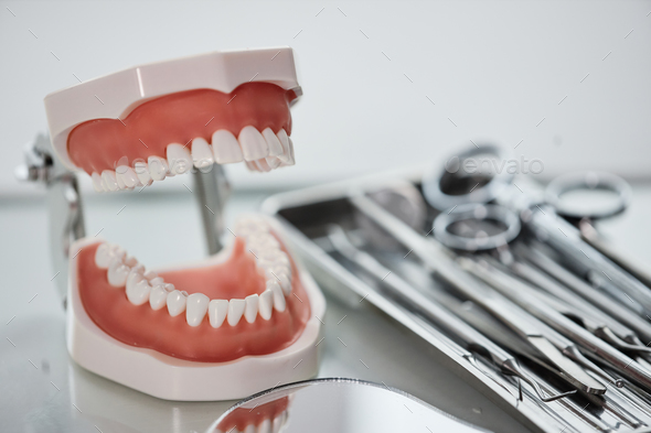 Closeup teeth and jaw model with set of tools in dental clinic Stock ...
