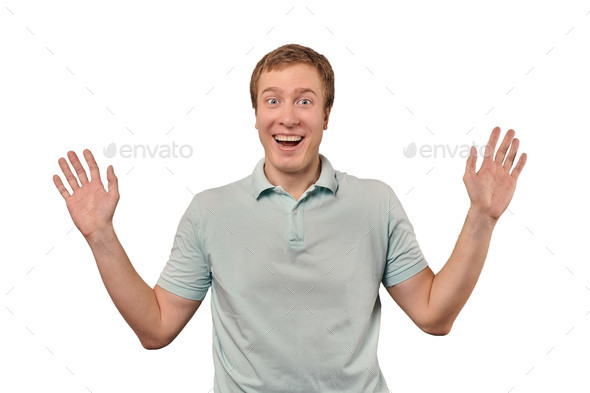 Funny smiling man in T-shirt showing palms of hands, unexpected surprise gesture, white ...