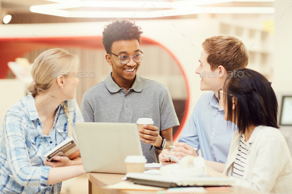 Happy students sharing project ideas Stock Photo by Media_photos ...