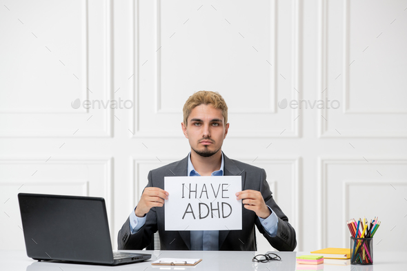 ADHD cute young stressed worker in the office behind desk with computer ...