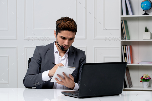 customer service young cute guy in grey office suit with computer ...