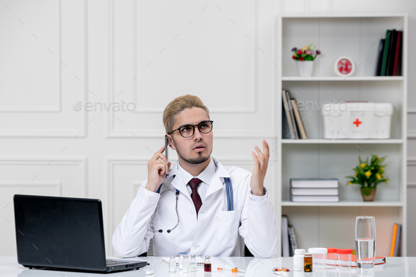 medical smart handsome cute doctor guy in lab coat in hospital with ...