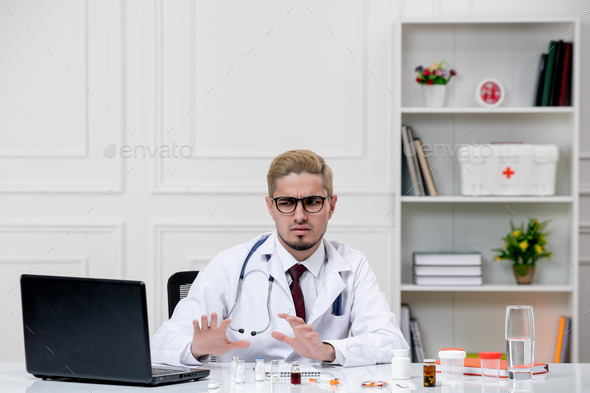 medical cute smart handsome doctor guy in lab coat in hospital with ...