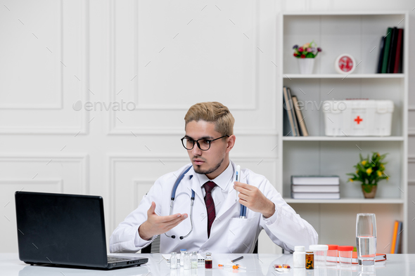 medical cute smart handsome doctor guy in lab coat in hospital with ...