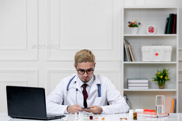 medical cute smart handsome doctor guy in lab coat in hospital with ...