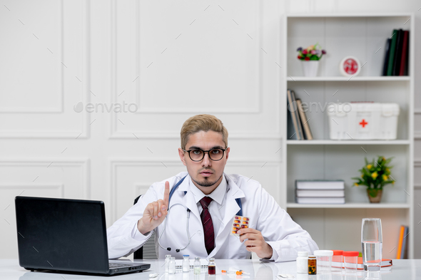 medical cute smart handsome doctor guy in lab coat in hospital with ...