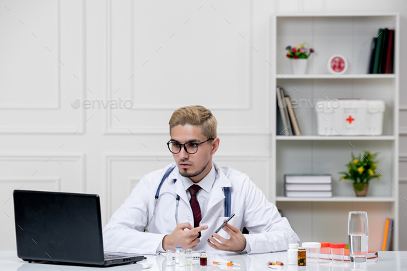 medical cute smart handsome doctor guy in lab coat in hospital with ...