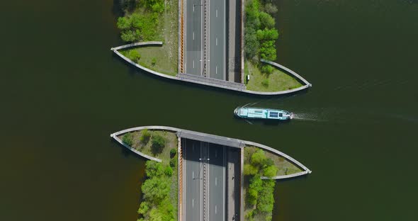 Aquaduct Veluwemeer water bridge with boat crossing above highway ...