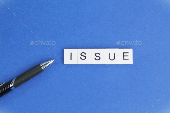 pen and alphabet letters with the word issue. Stock Photo by fauziEv8