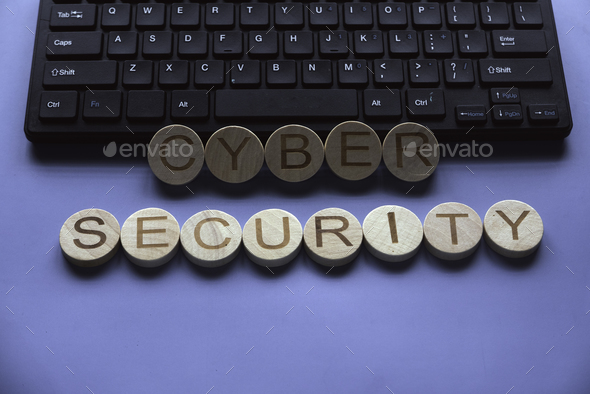 Cyber security concept. Computer keyboard and wooden alphabet. Stock ...