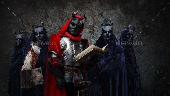 Five brothers of dark cult dressed in dark robes Stock Photo by fxquadro