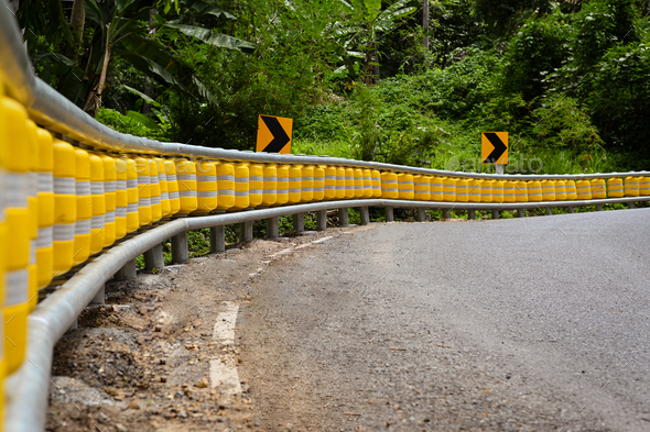 Roller Barrier installed in curves on the road for safety. Stock Photo ...
