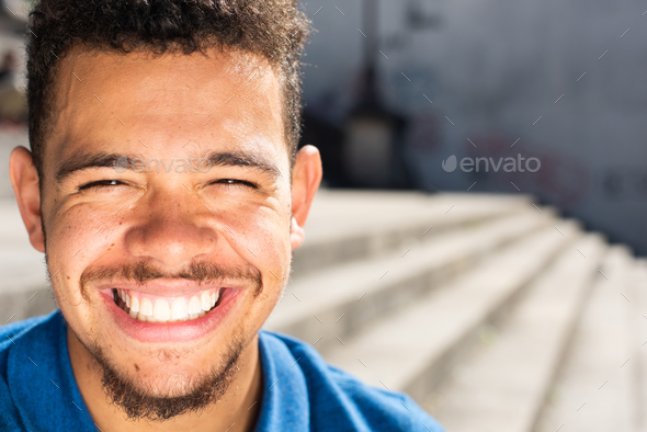 Close up portrait handsome young mixed race man smiling Stock Photo by ...