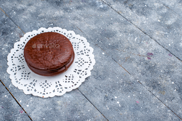 front view delicious chocolate cake round formed isolated on the grey ...