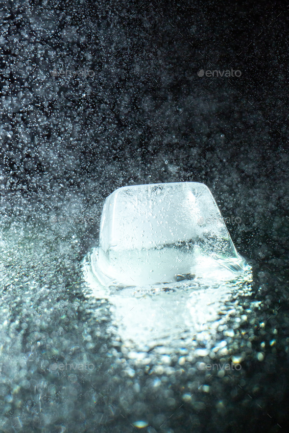 Side view of white ice on dark isolated wave background with free space ...