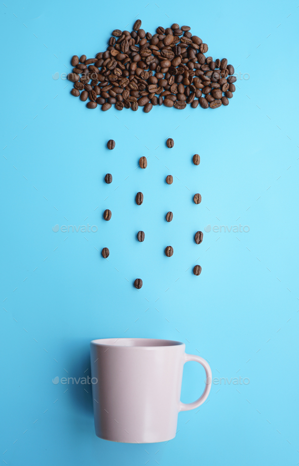 Coffee beans arrange with rainy cloud shape and raining to pink coffee ...