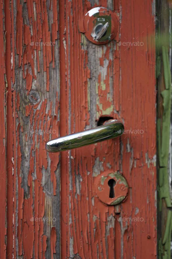 a close up image of an open door handle with rust on it Stock Photo by ...