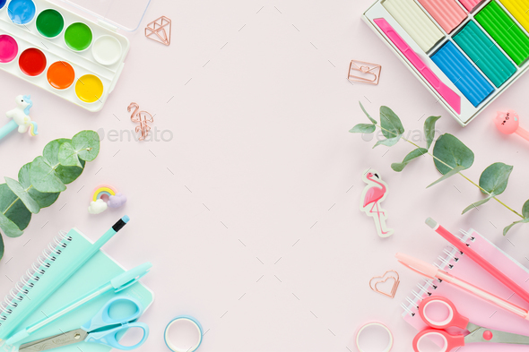 A frame of pastel-colored school supplies on a pink background, Stock ...