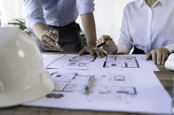 Architecture Engineer Teamwork Meeting, Drawing and working for ...