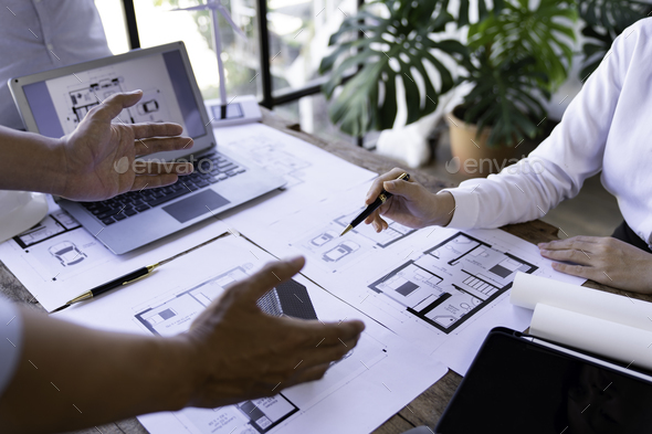 Architecture Engineer Teamwork Meeting, Drawing and working for ...