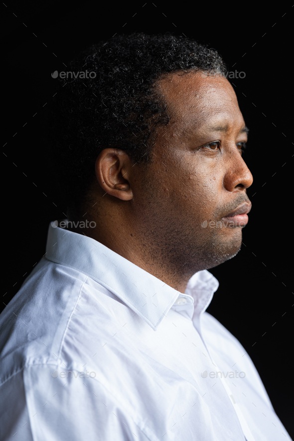 Portrait of handsome black man profile view Stock Photo by amazingmikael
