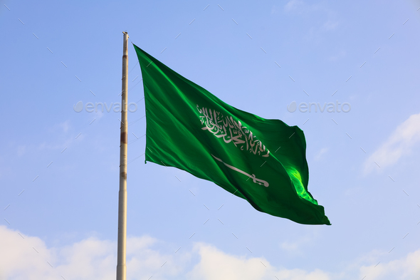 Saudi Arabia national flag waving in sky - Saudi National Day Stock ...