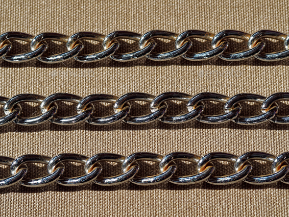 Metal shiny chain 3 rows on the textile Stock Photo by xewex | PhotoDune