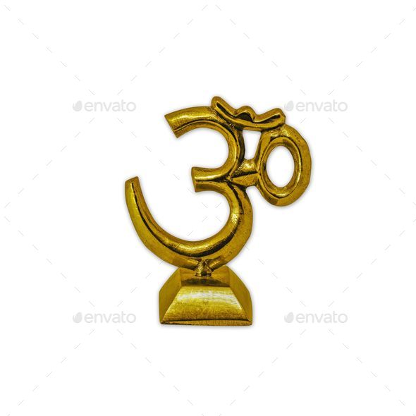 Polished solid brass om sign, with a small base, displayed on a white ...