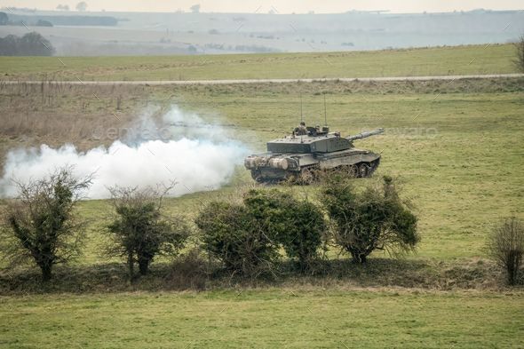 Challenger commander and gunner directing a main battle tank Stock ...
