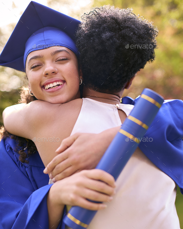 Proud Mother Celebrating And Hugging Teenage Daughter Wearing ...