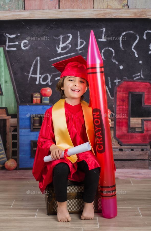 Adorable little boy proudly displaying a VPK diploma during ...