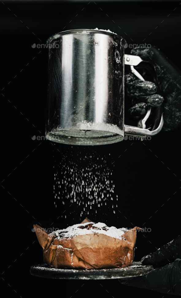 Chef spilling sugar powder on cake Stock Photo by wirestock | PhotoDune