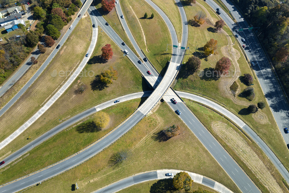 American freeway intersection with fast driving cars and trucks. Stock ...