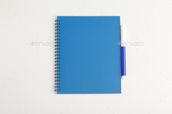 top view blue copybook with pen on white background drawing art paint ...