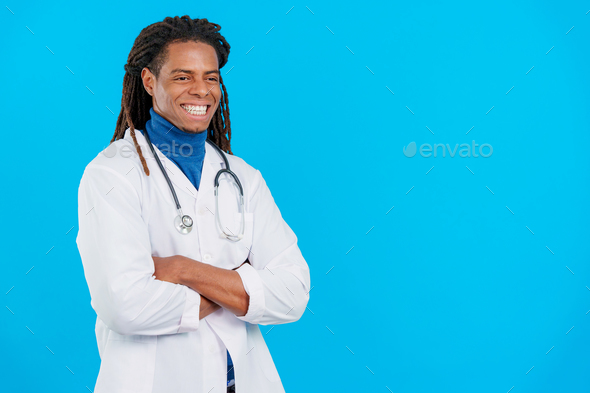 Friendly latin doctor with dreadlocks in uniform and stethoscope Stock ...