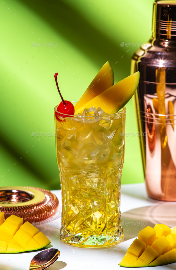 Mango rum collins alcoholic cocktail with rum, syrup, ginger beer ...