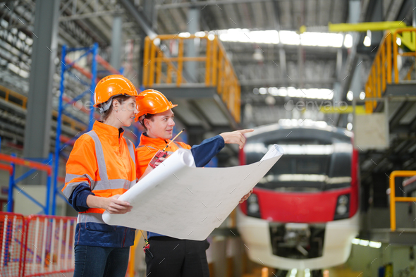 The Engineer Checks The Condition Of Electric Train at railway track ...