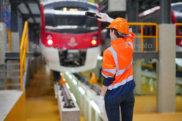 The Engineer Checks The Condition Of Electric Train at railway track ...