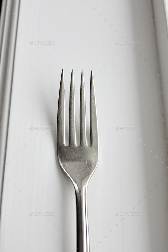 Single Fork and White Background Stock Photo by couragesings | PhotoDune