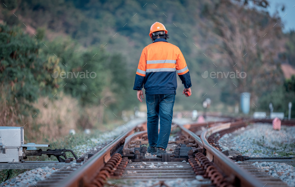 Engineer railway under inspection and checking construction railway ...