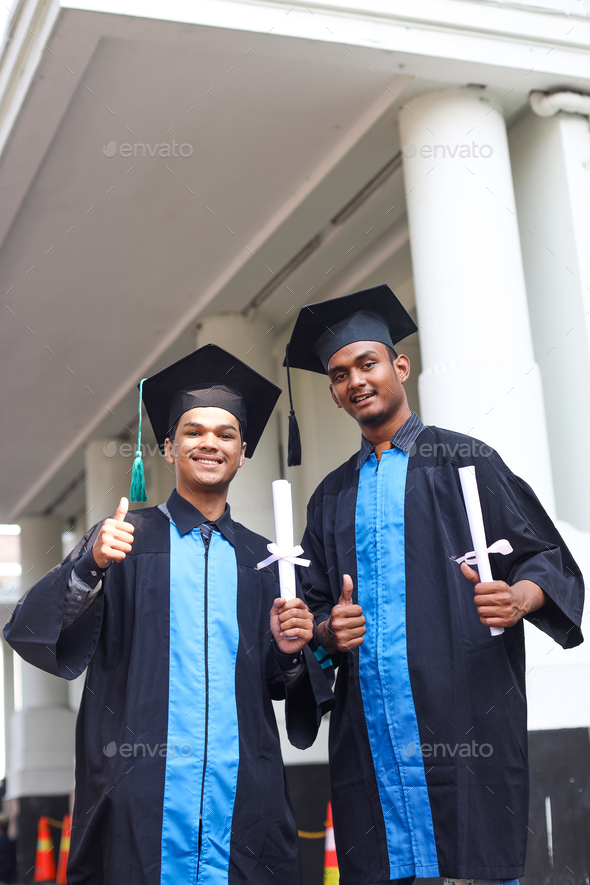 Graduation day celebration with friends Stock Photo by Garakta-Studio