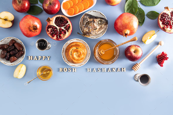 traditional products on a blue background with wooden letters Rosh ...