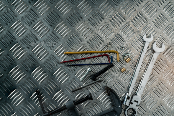 Top view of tools on industrial metal checker plate. Metal checkerplate ...