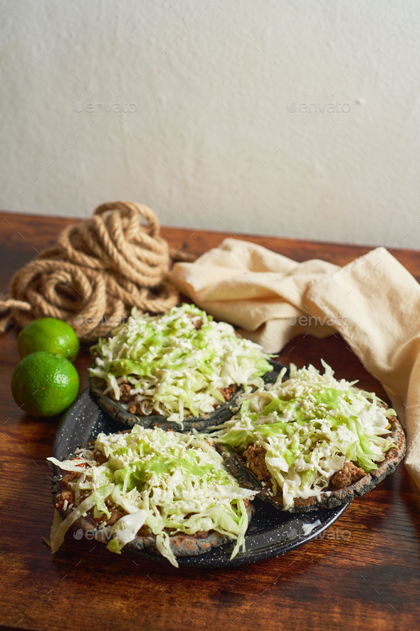 Sopes, with blue corn, traditional mexican street food. Stock Photo by ...
