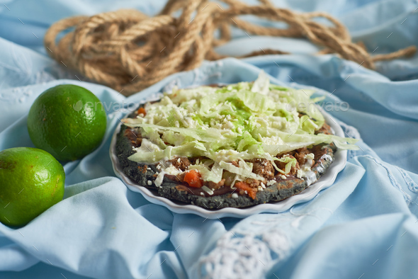 Mexican sopes with green sauce, Traditional food in Mexico Stock Photo ...