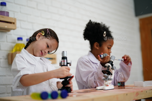 Pupils experimenting in science class Stock Photo by FoToArtist_1 ...