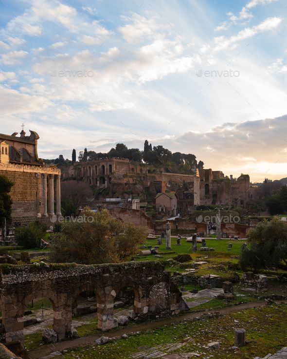 View of a sprawling cityscape and ruins in the ancient city of Rome ...